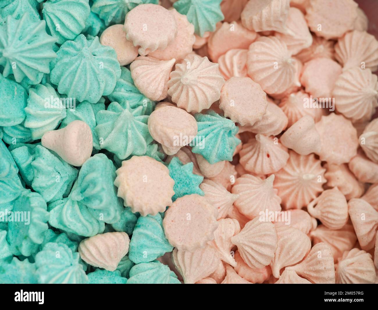 bunch of pink and light blue meringues for cake and sweets decoration ...