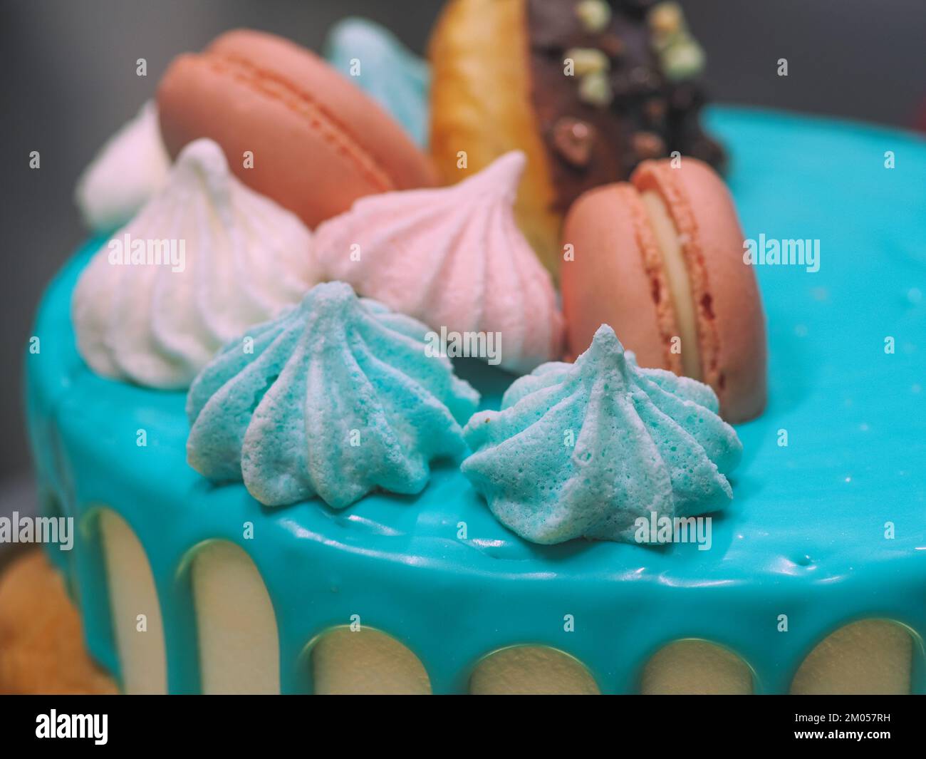 donuts meringue berries and sparkles topping on frosted icing drip ...