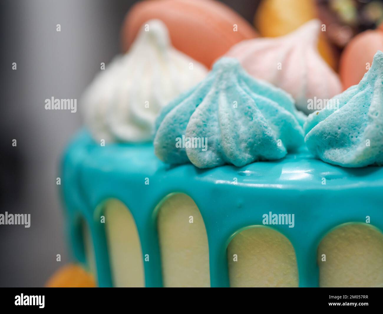 donuts meringue berries and sparkles topping on frosted icing drip ...