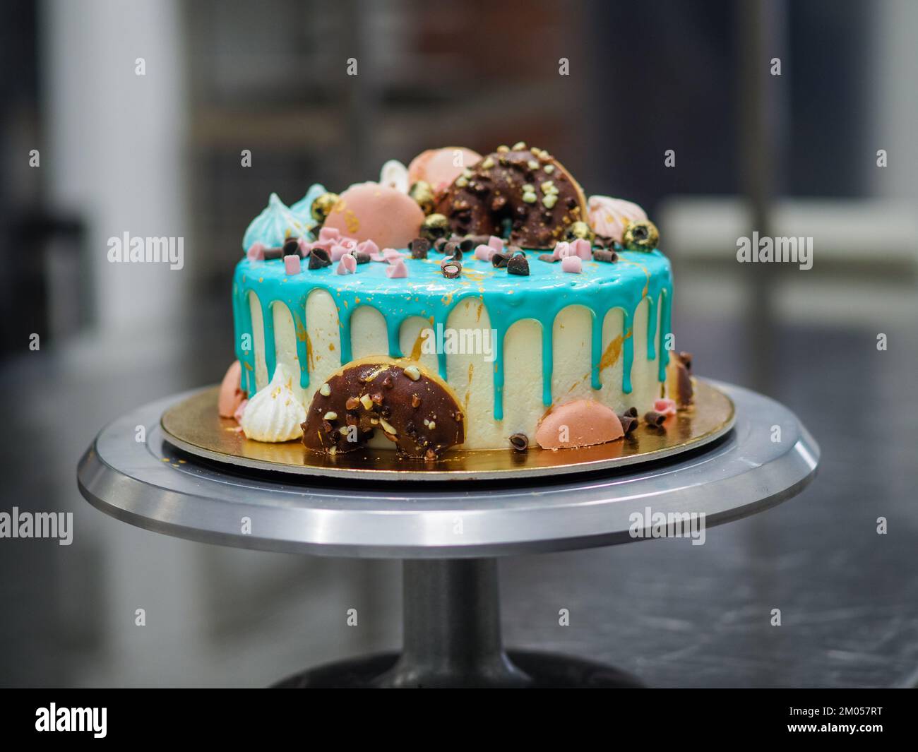 donuts meringue berries and sparkles topping on frosted icing drip ...
