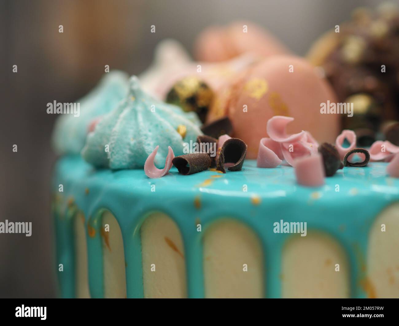 donuts meringue berries and sparkles topping on frosted icing drip ...