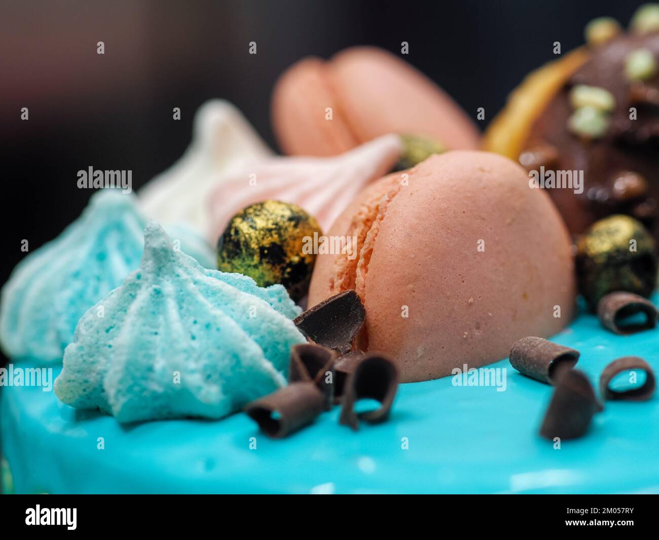 donuts meringue berries and sparkles topping on frosted icing drip ...