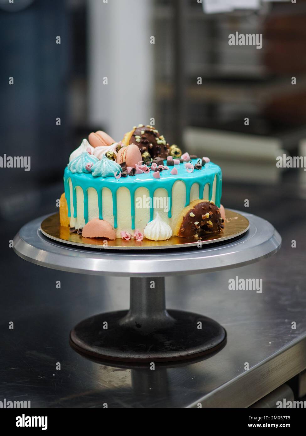 donuts meringue berries and sparkles topping on frosted icing drip ...