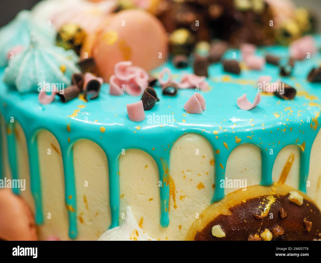 donuts meringue berries and sparkles topping on frosted icing drip ...