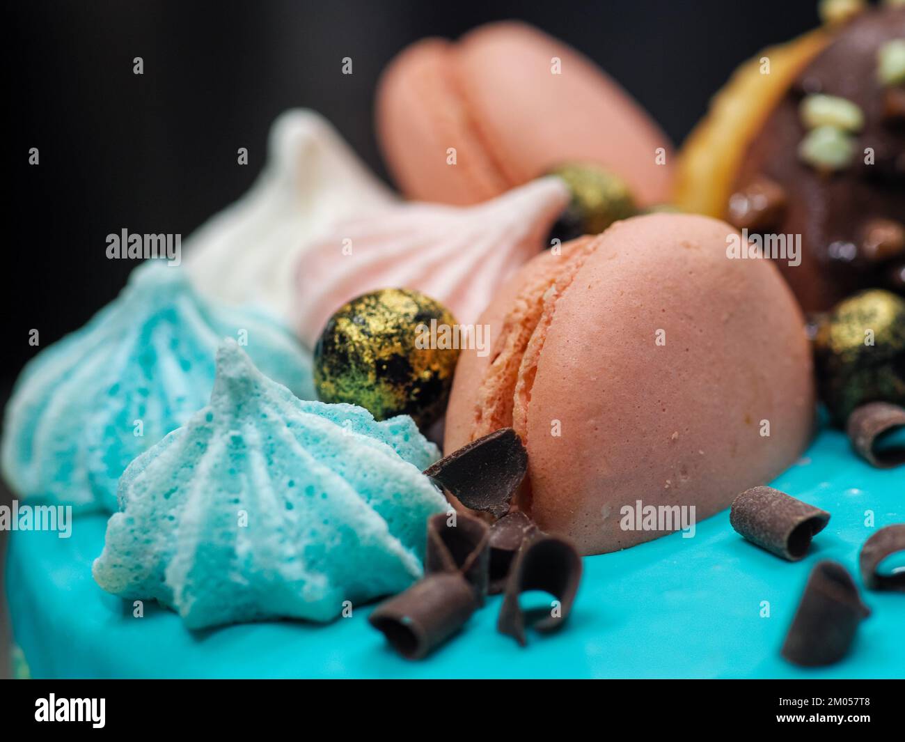 donuts meringue berries and sparkles topping on frosted icing drip ...