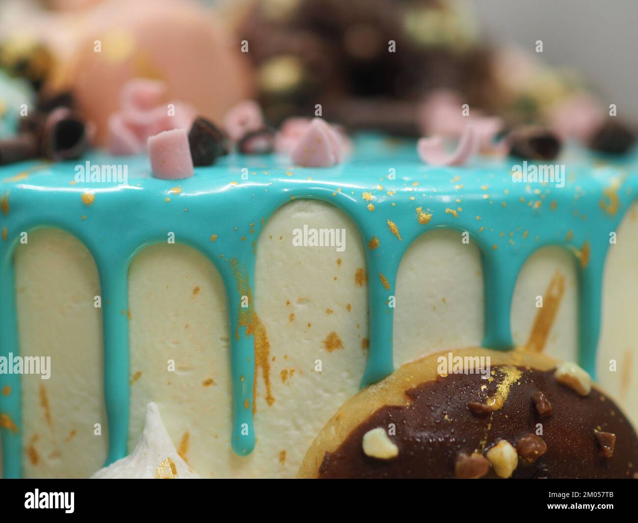 donuts meringue berries and sparkles topping on frosted icing drip ...