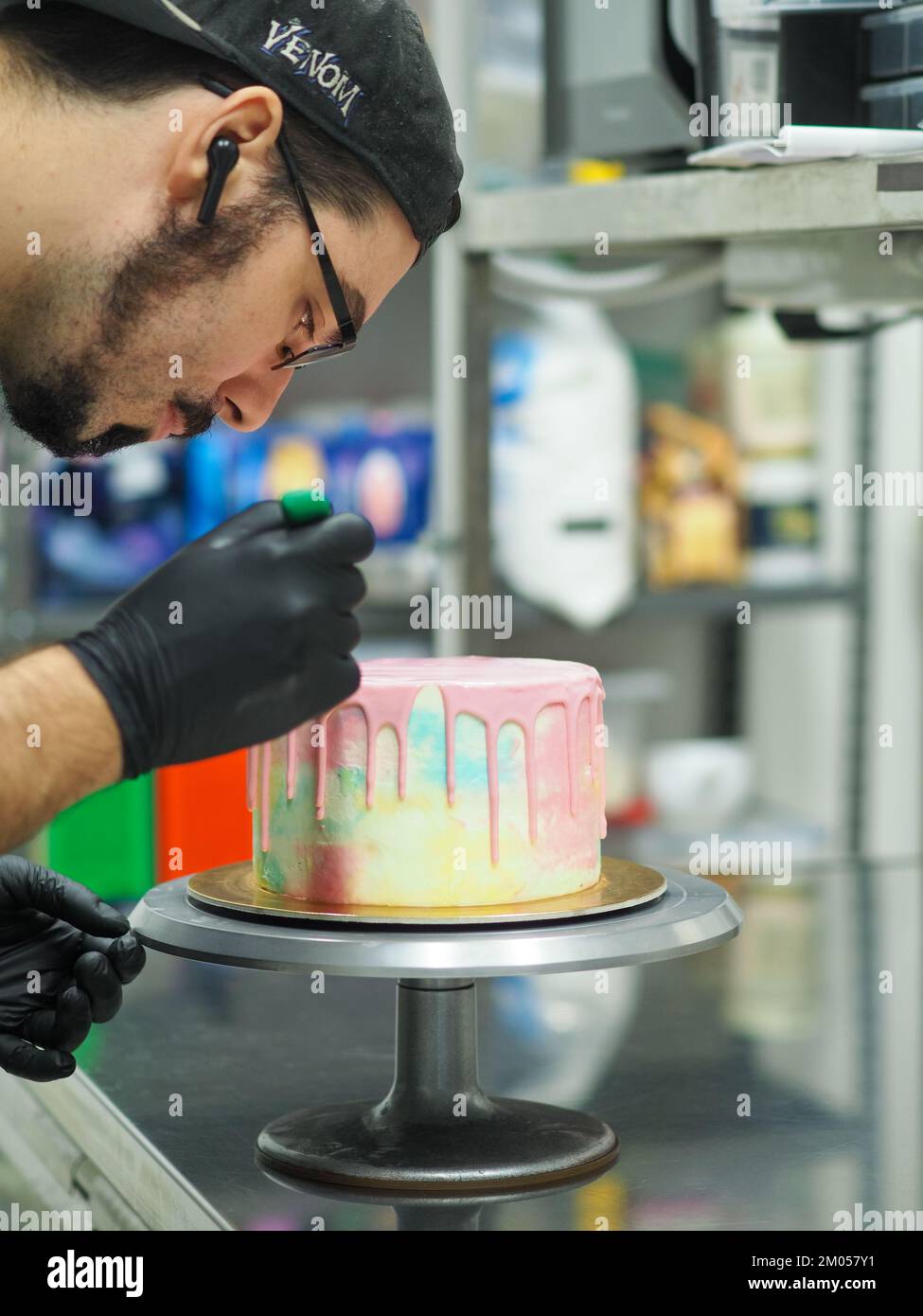 pasty chef artisan squeeze piping bag filling mixed with edible pink ...