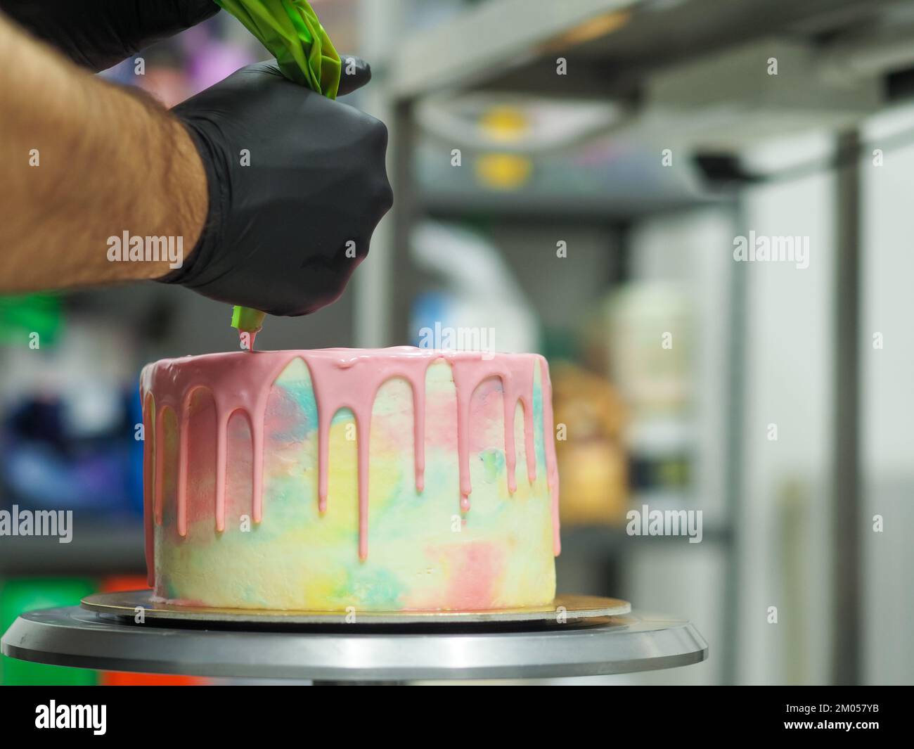 pasty chef artisan squeeze piping bag filling mixed with edible pink ...