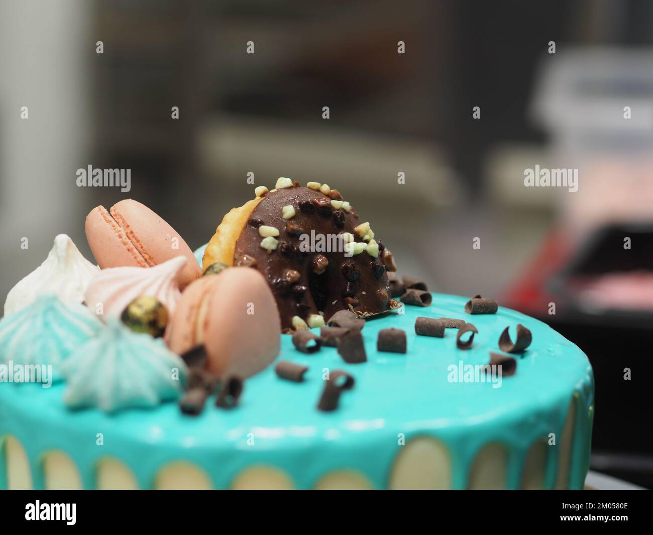 donuts meringue berries and sparkles topping on frosted icing drip ...