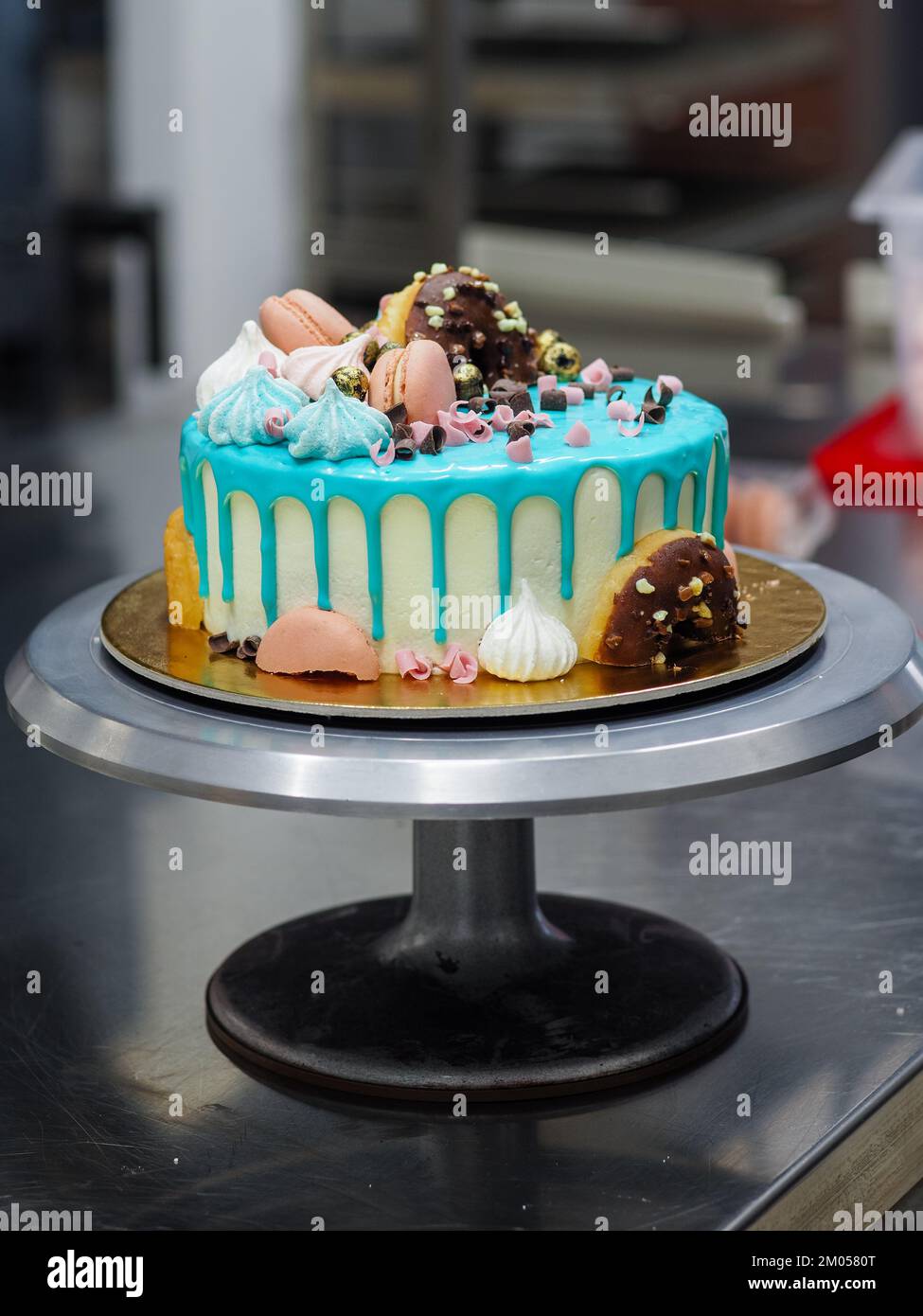 donuts meringue berries and sparkles topping on frosted icing drip ...