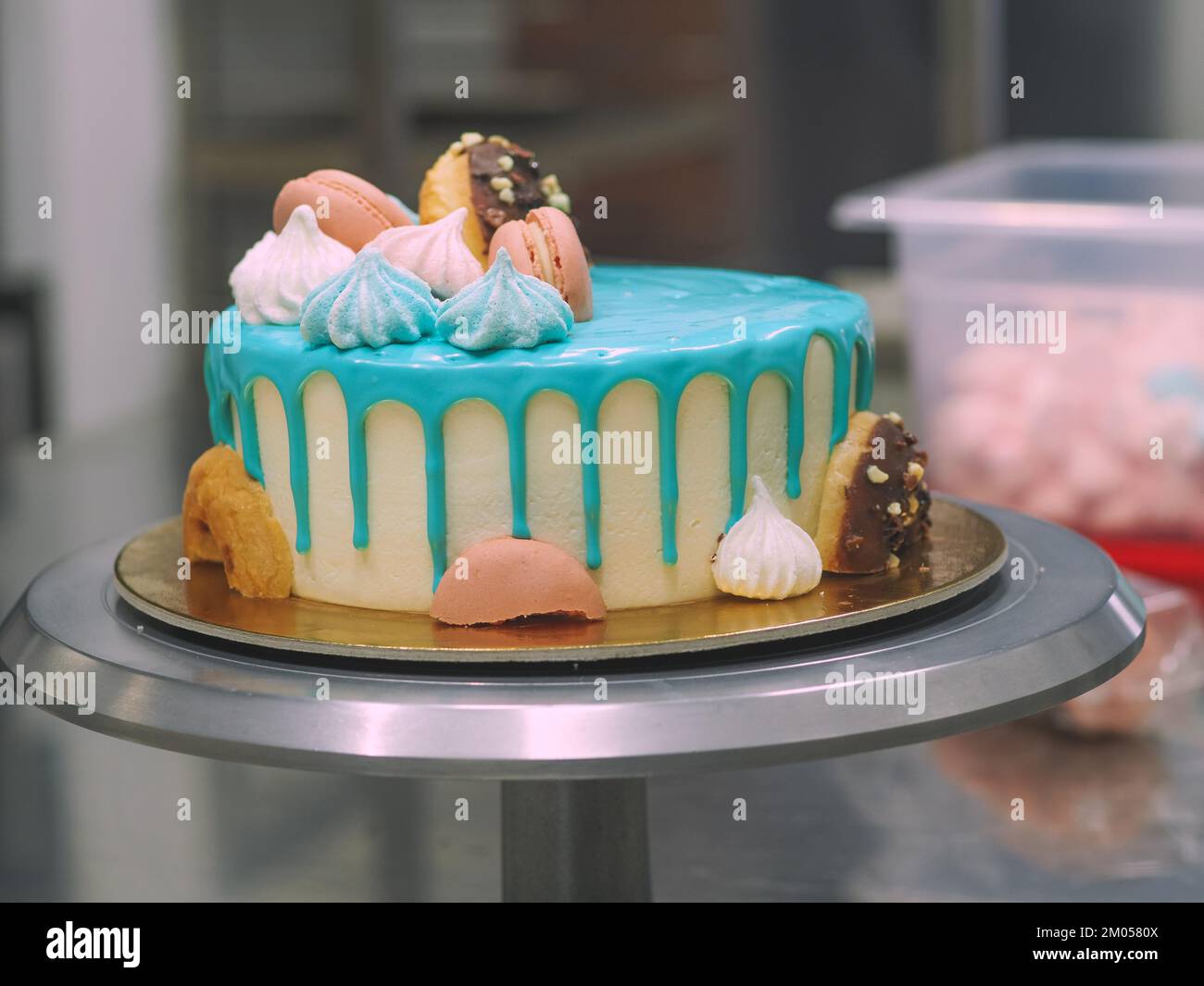 donuts meringue berries and sparkles topping on frosted icing drip ...