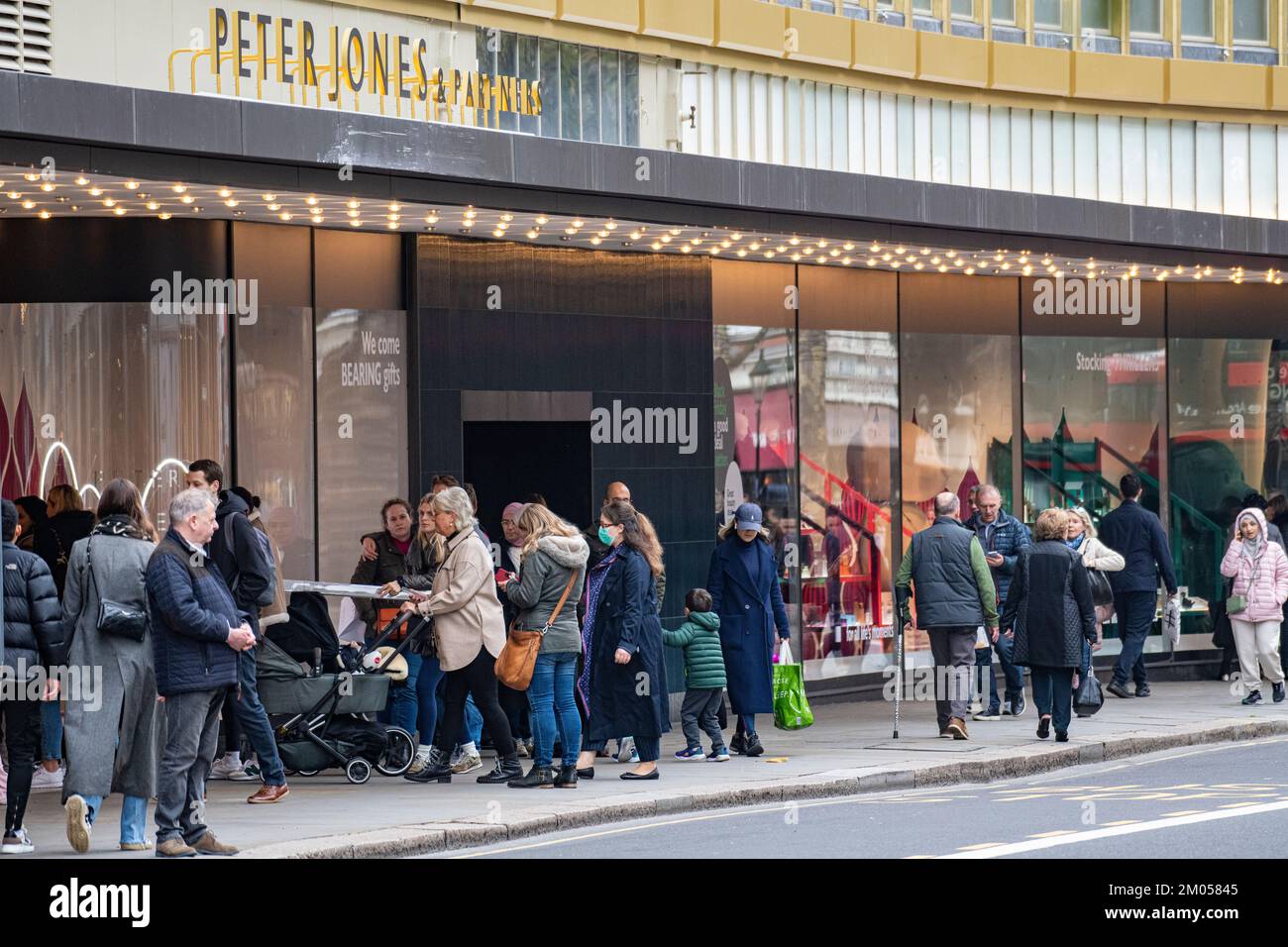 Queues of shoppers outside Peter Jones in Chelsea, waiting for it to ...