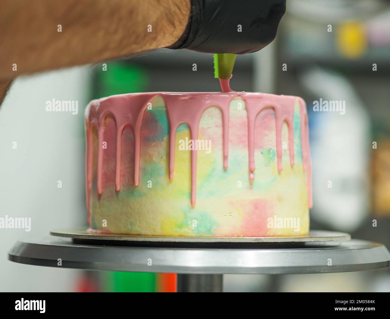 pasty chef artisan squeeze piping bag filling mixed with edible pink ...