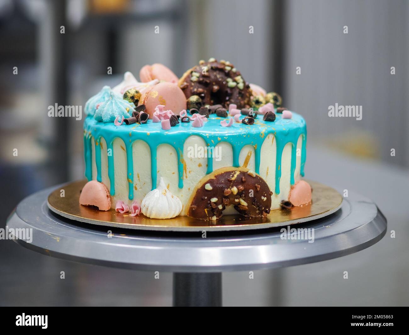 donuts meringue berries and sparkles topping on frosted icing drip ...