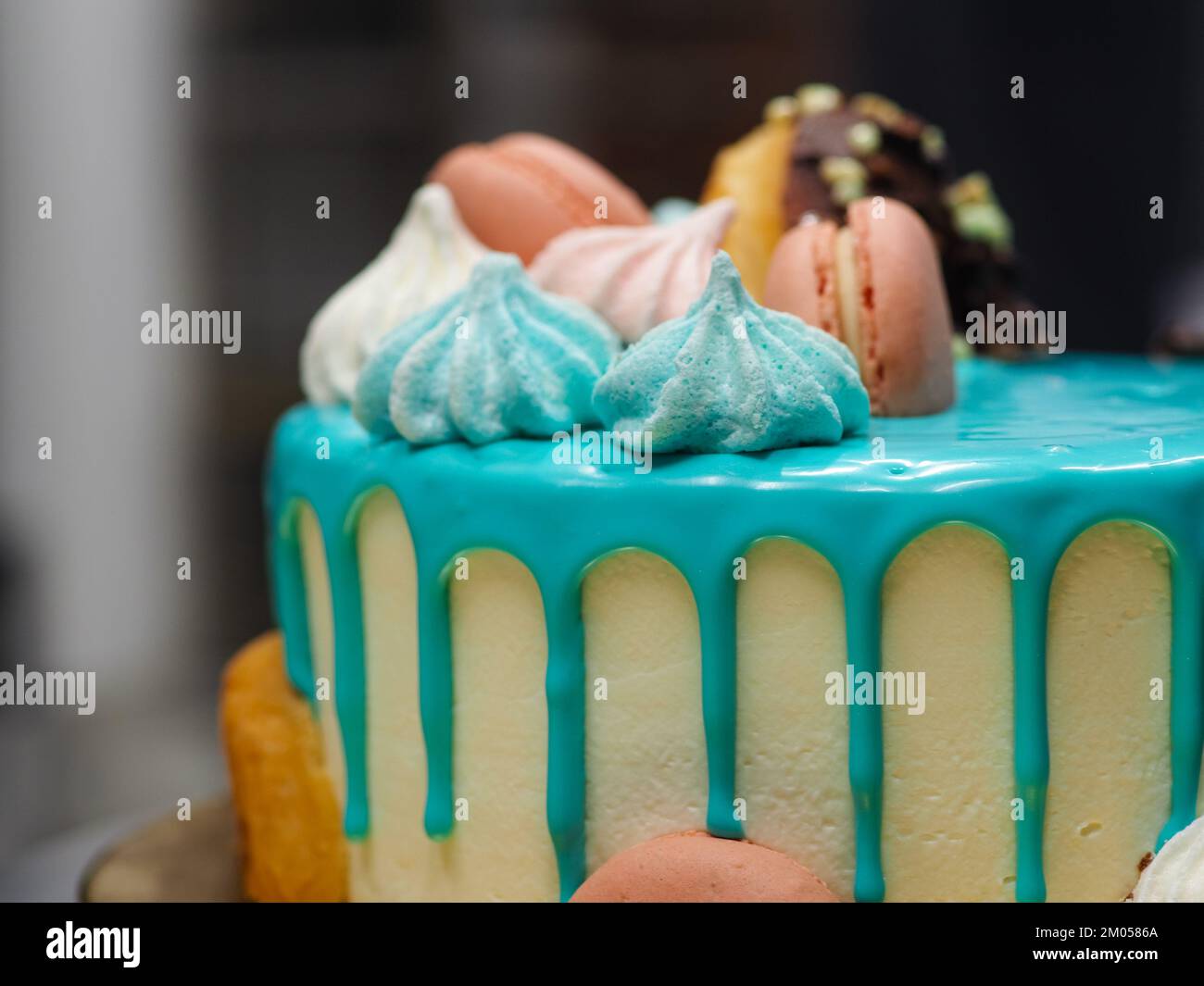 donuts meringue berries and sparkles topping on frosted icing drip ...