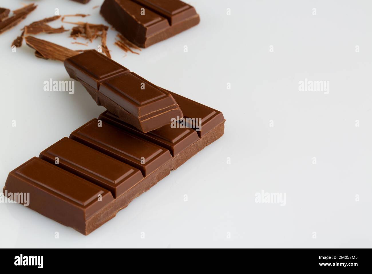 Cubes organic milk chocolate hi-res stock photography and images - Alamy