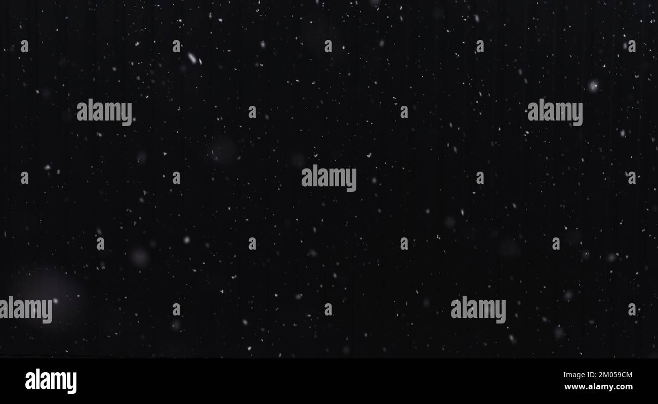 Animation snow falling on black hi-res stock photography and images - Alamy