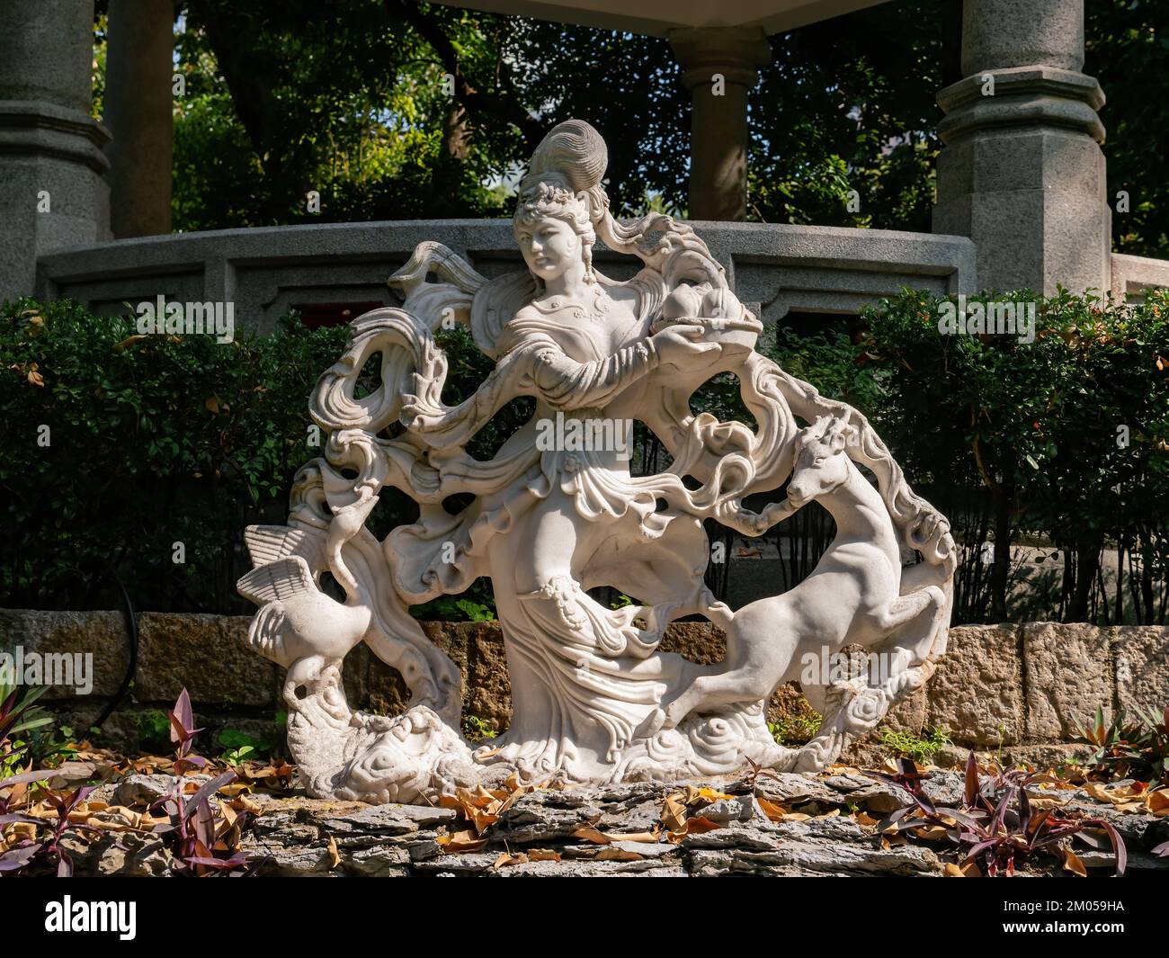 Sunny view of the statue in Pavilion of the Lou Lim Ieoc Garden at ...
