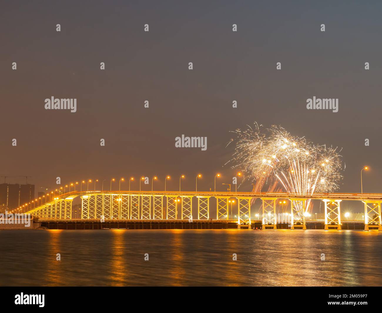 Night view of the fireworks over bridge at Macau Stock Photo - Alamy