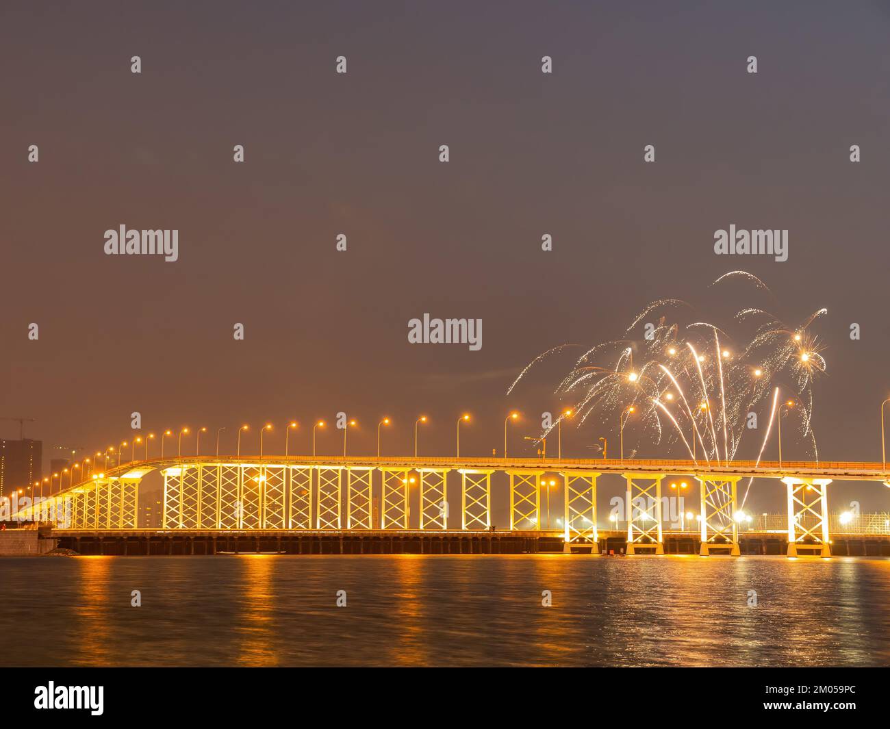 Night view of the fireworks over bridge at Macau Stock Photo - Alamy