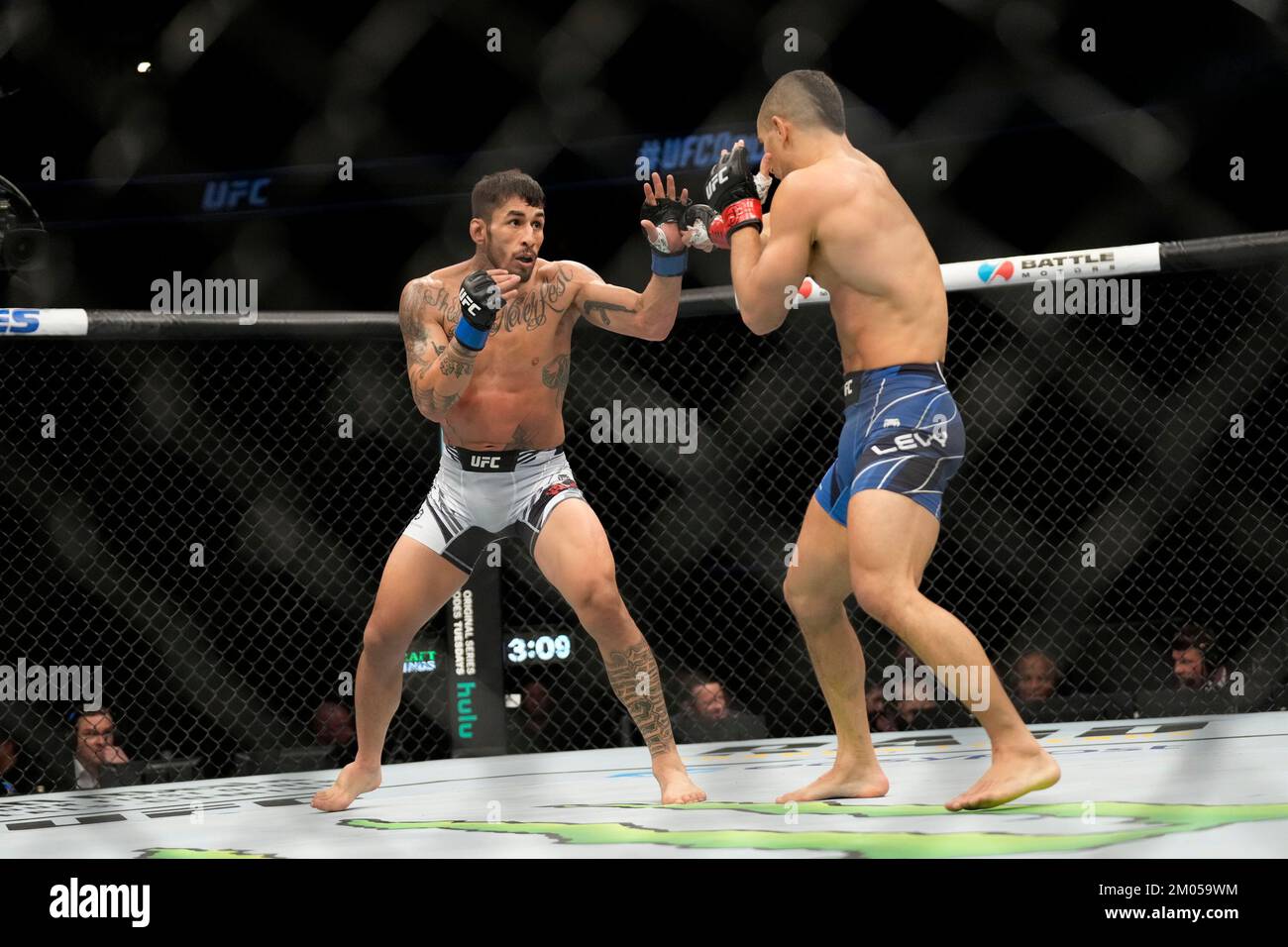 ORLANDO, FL - December 3: Natan Levy (L) and Genaro Valdez R) step in ...