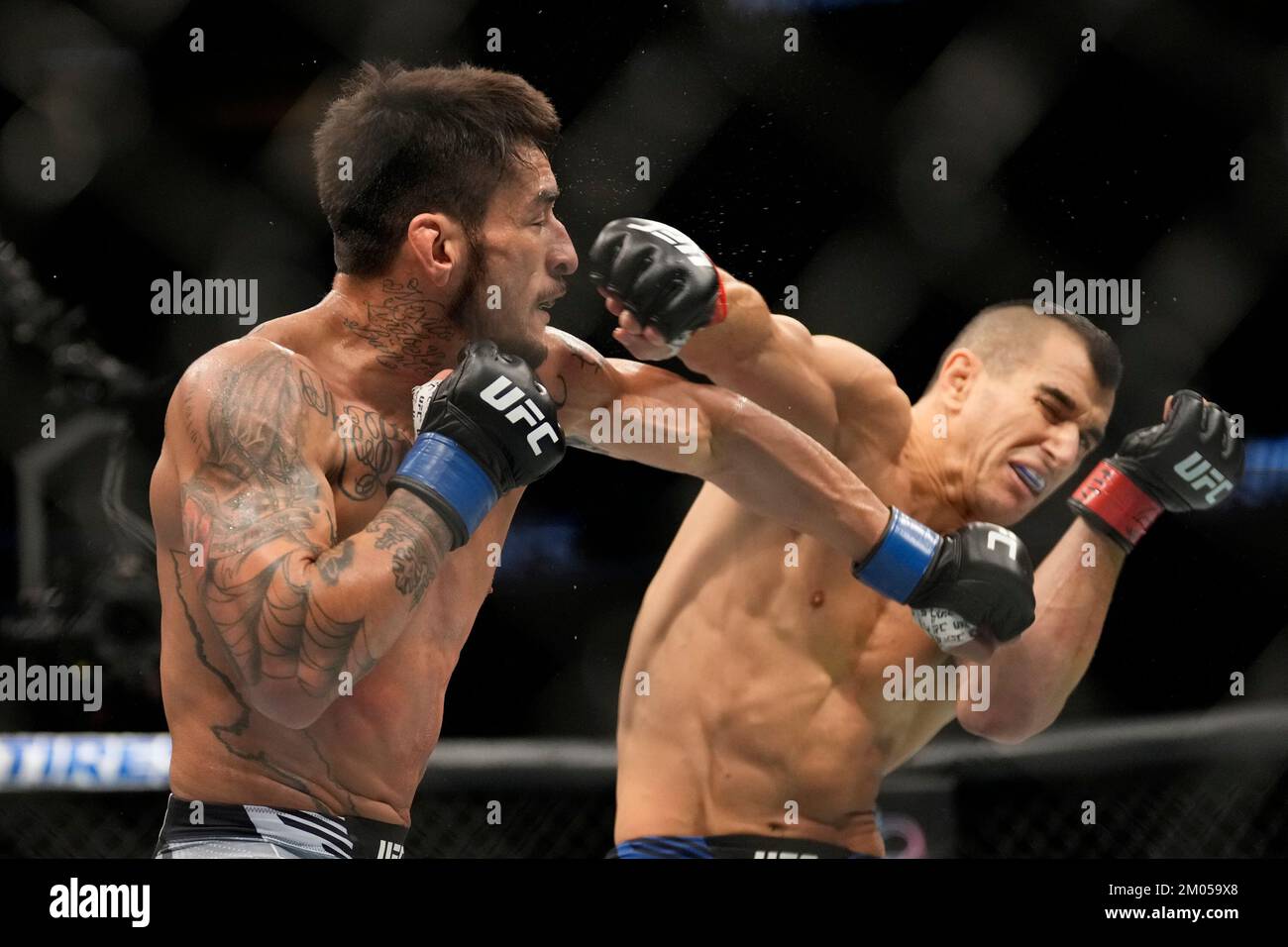 ORLANDO, FL - December 3: Natan Levy (L) and Genaro Valdez R) step in ...