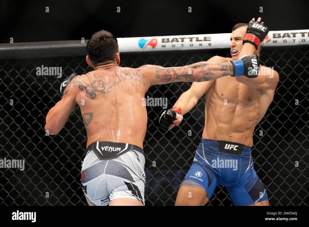ORLANDO, FL - December 3: Natan Levy (L) and Genaro Valdez R) step in ...