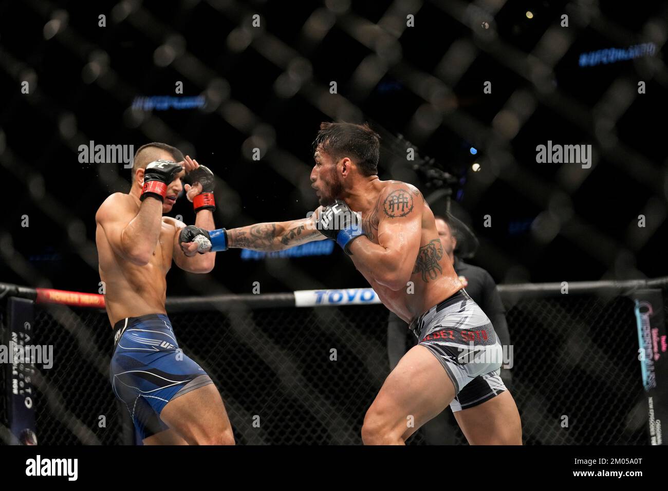 ORLANDO, FL - December 3: Natan Levy (L) and Genaro Valdez R) step in ...