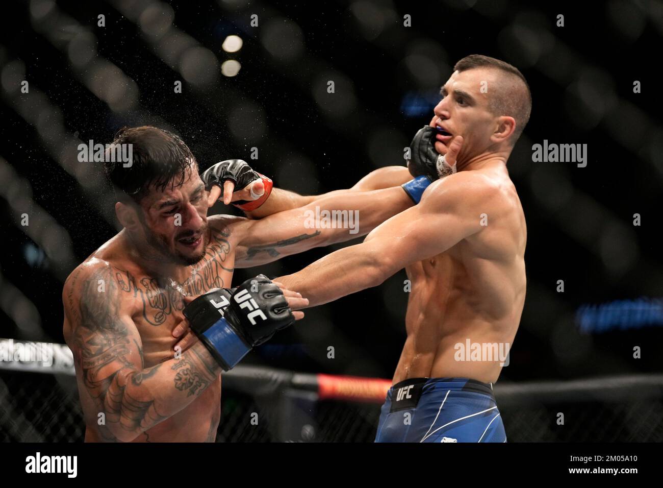 ORLANDO, FL - December 3: Natan Levy (L) and Genaro Valdez R) step in ...