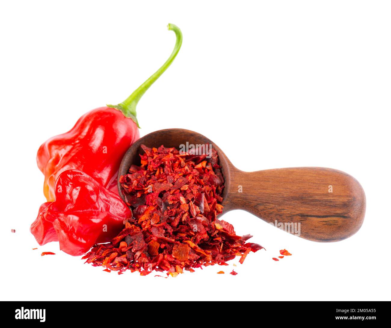 Fresh and dry ground red chili peppers isolated on white background ...