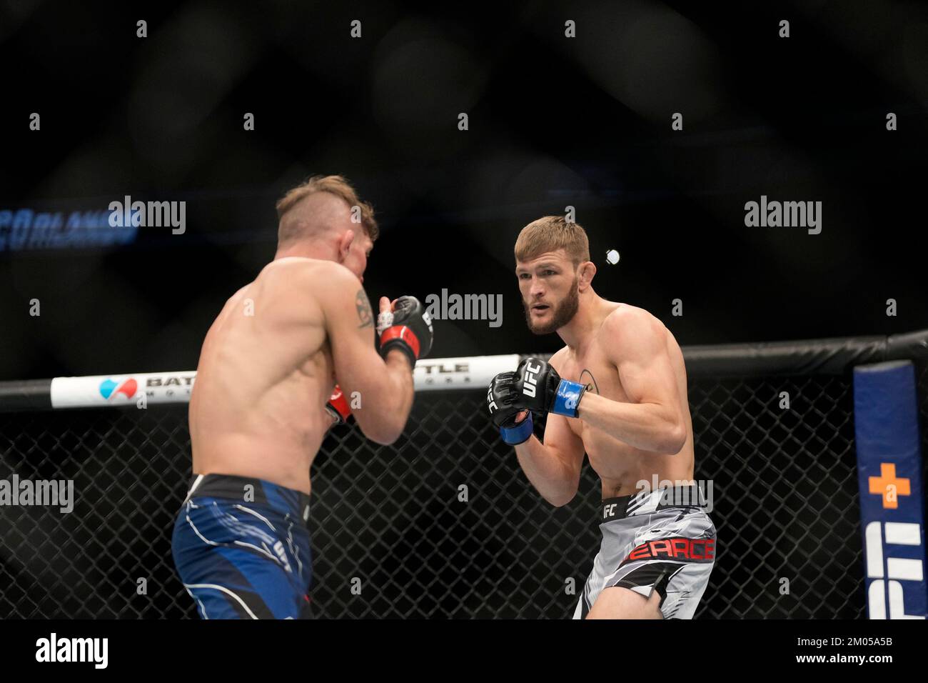 ORLANDO, FL - December 3: Darren Elkins (L) and Jonathan Pearce (R ...