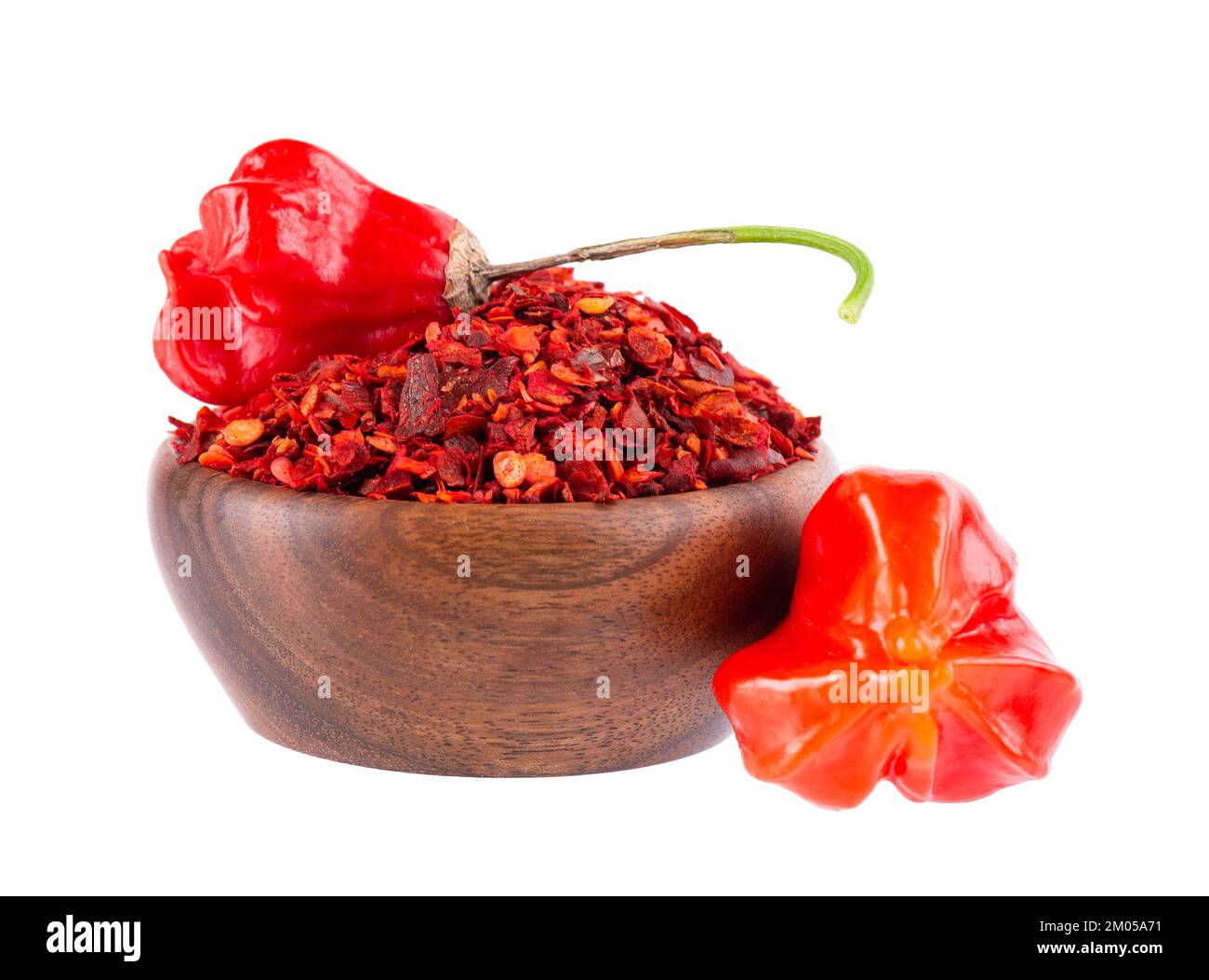 Fresh and dry ground red chili peppers isolated on white background ...