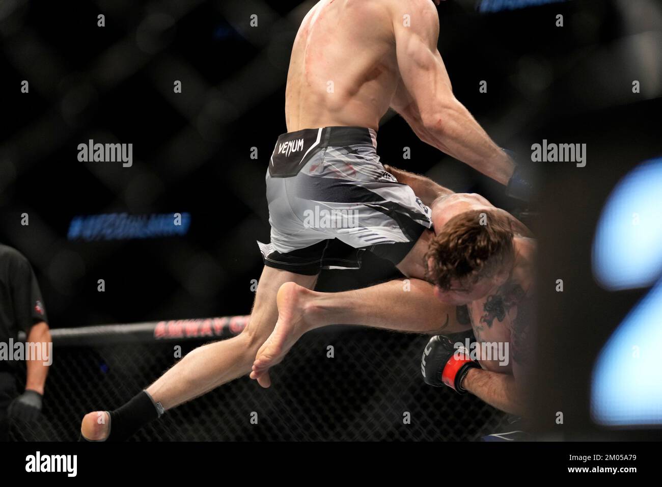 ORLANDO, FL - December 3: Darren Elkins (L) and Jonathan Pearce (R ...