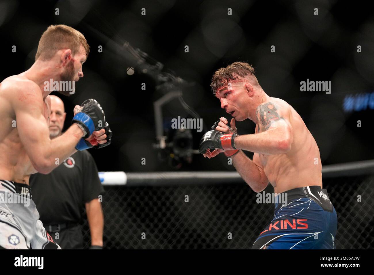 ORLANDO, FL - December 3: Darren Elkins (L) and Jonathan Pearce (R ...