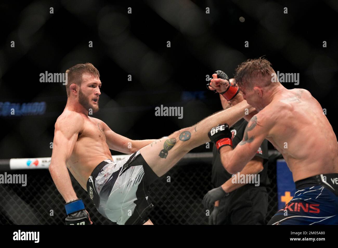 ORLANDO, FL - December 3: Darren Elkins (L) and Jonathan Pearce (R ...