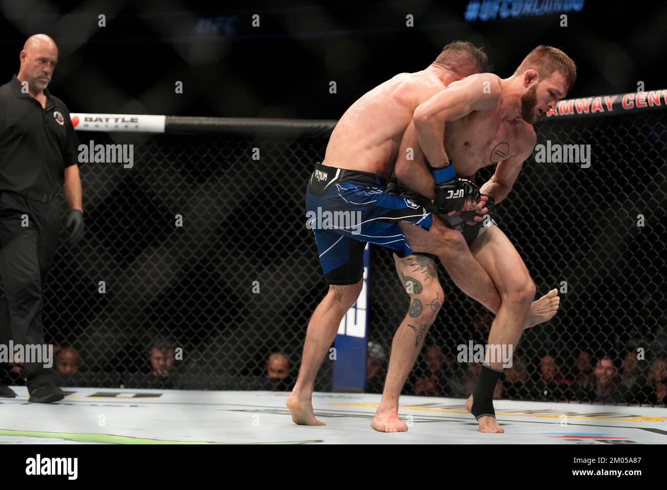 ORLANDO, FL - December 3: Darren Elkins (L) and Jonathan Pearce (R ...