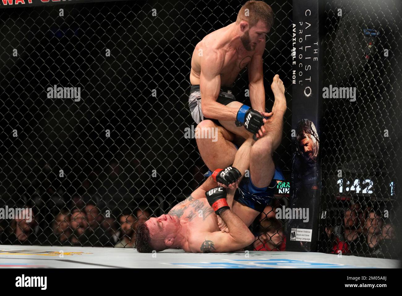 ORLANDO, FL - December 3: Darren Elkins (L) and Jonathan Pearce (R ...