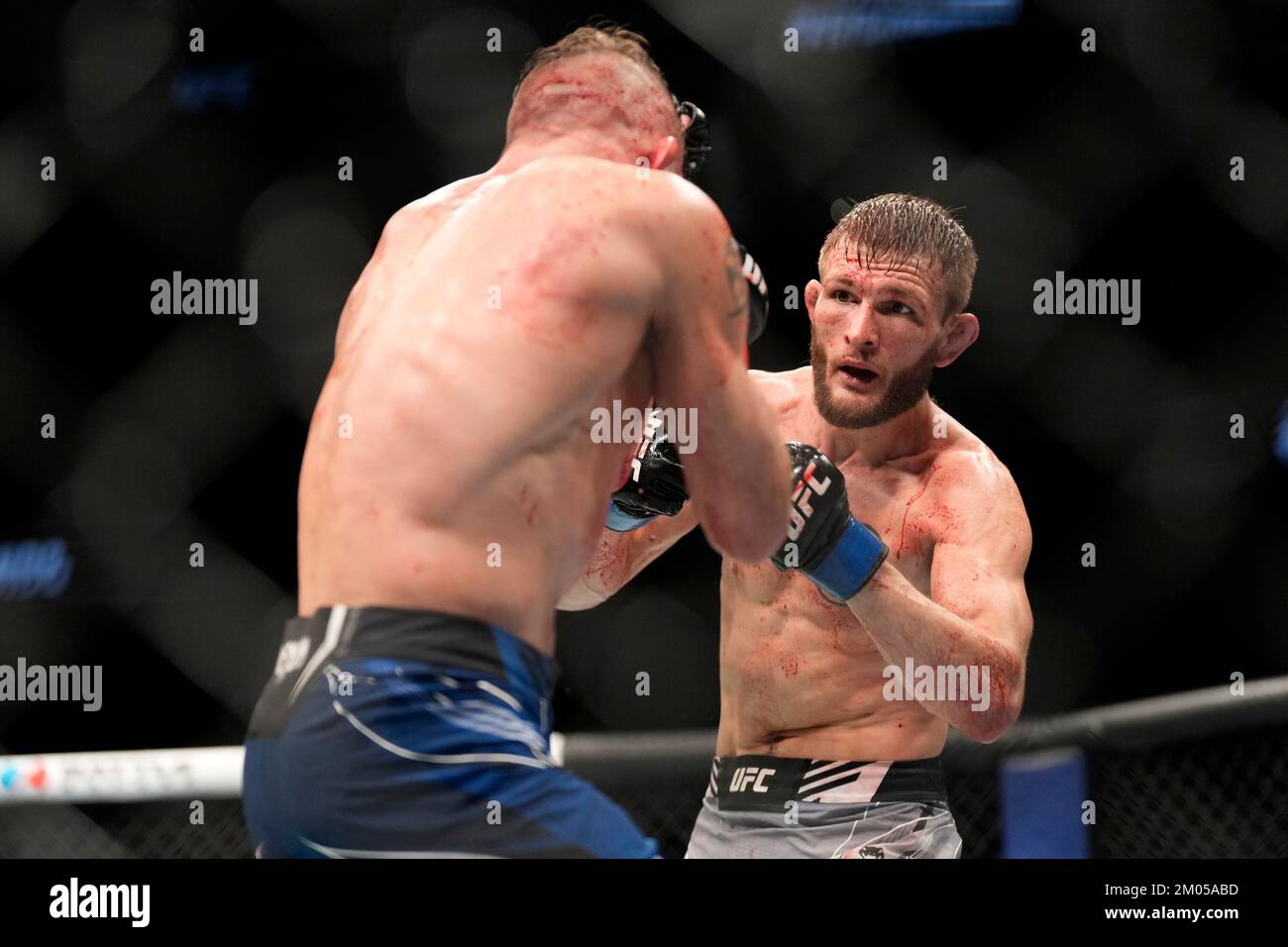 ORLANDO, FL - December 3: Darren Elkins (L) and Jonathan Pearce (R ...