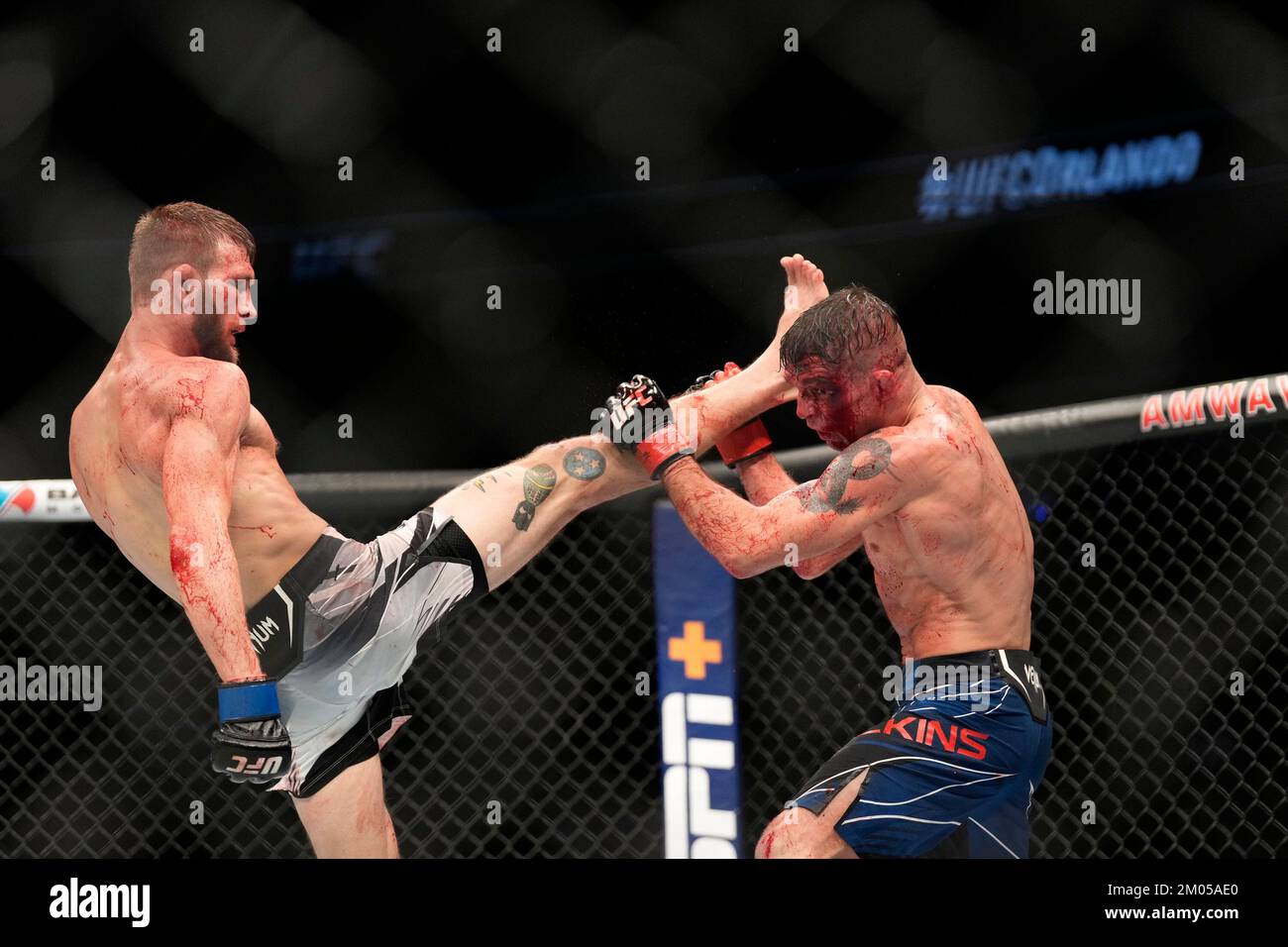 ORLANDO, FL - December 3: Darren Elkins (L) and Jonathan Pearce (R ...