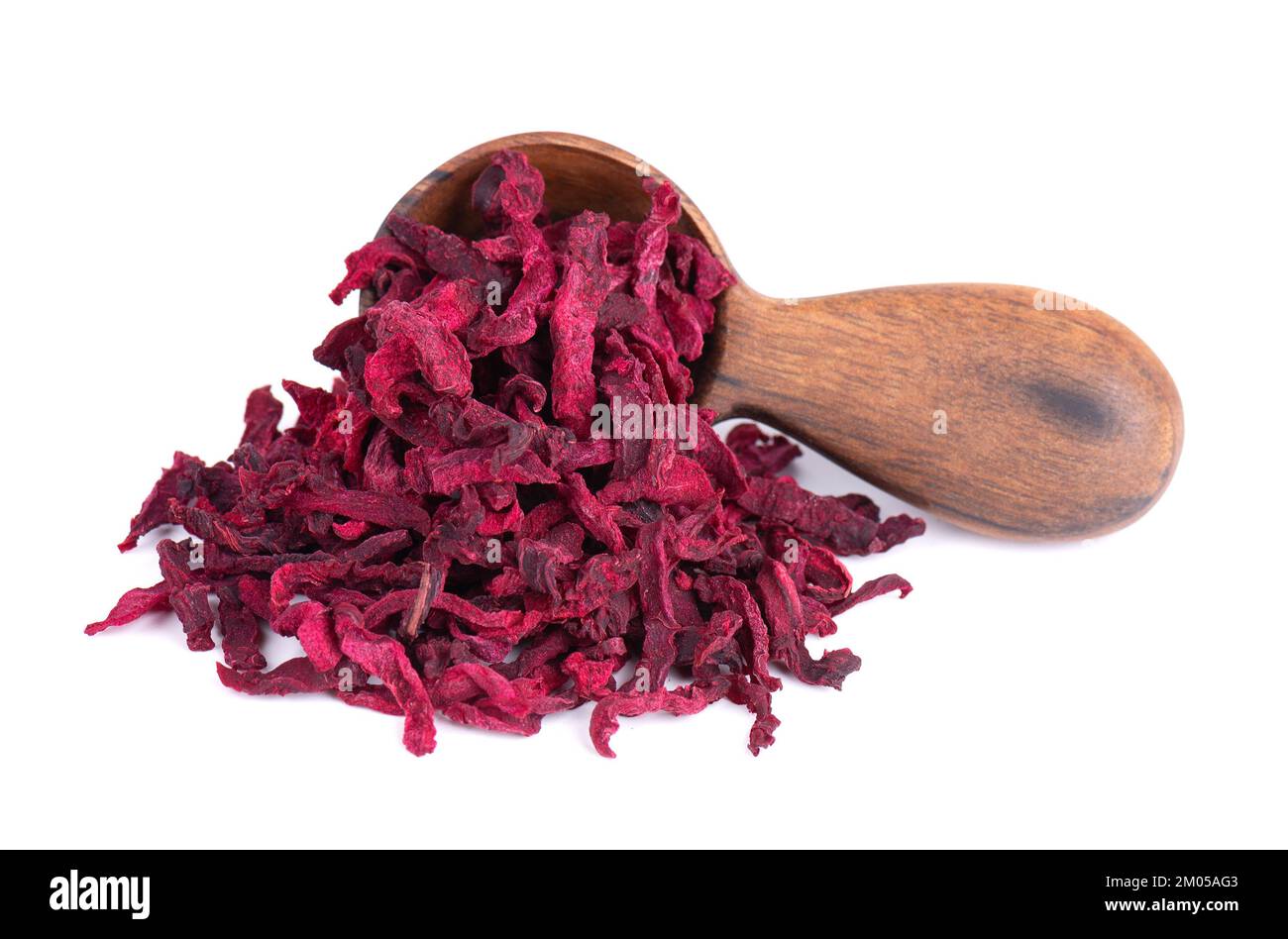 Dry beetroot in wooden spoon, isolated on the white background. Chopped ...