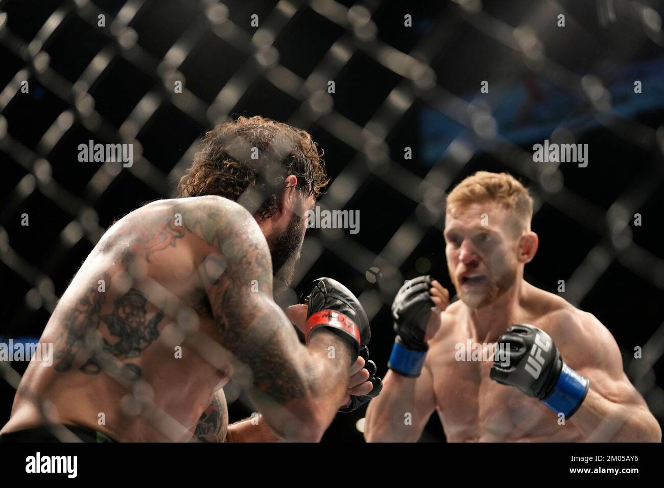 ORLANDO, FL - December 3: Clay Guida (L) and Scott Holtzman (R) step in ...