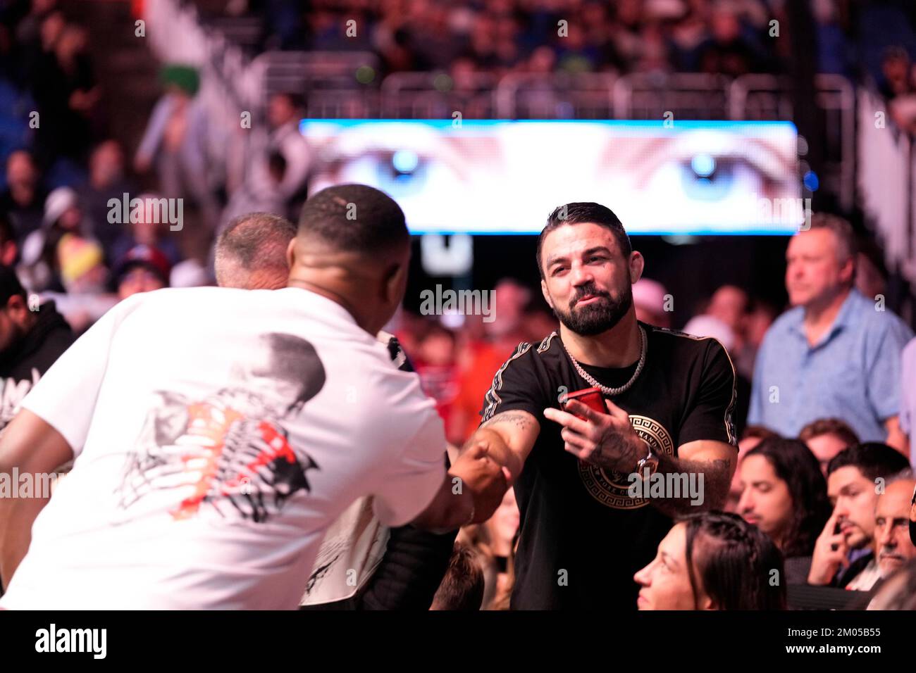 ORLANDO, FL - December 3: Jamahal Hill and Mike Perry share a handshake ...