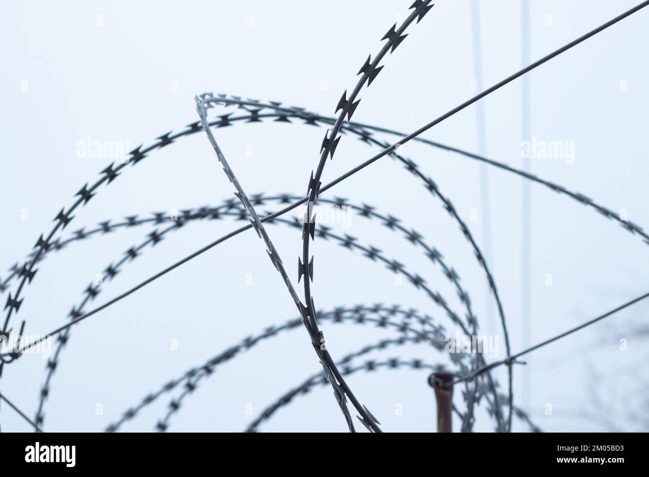 Wall barbed wire sunset hi-res stock photography and images - Alamy