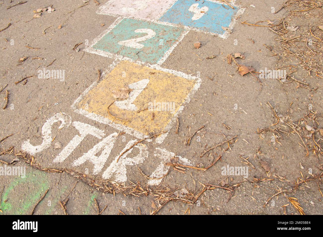 children's game on the asphalt, numbers are painted on the asphalt with ...