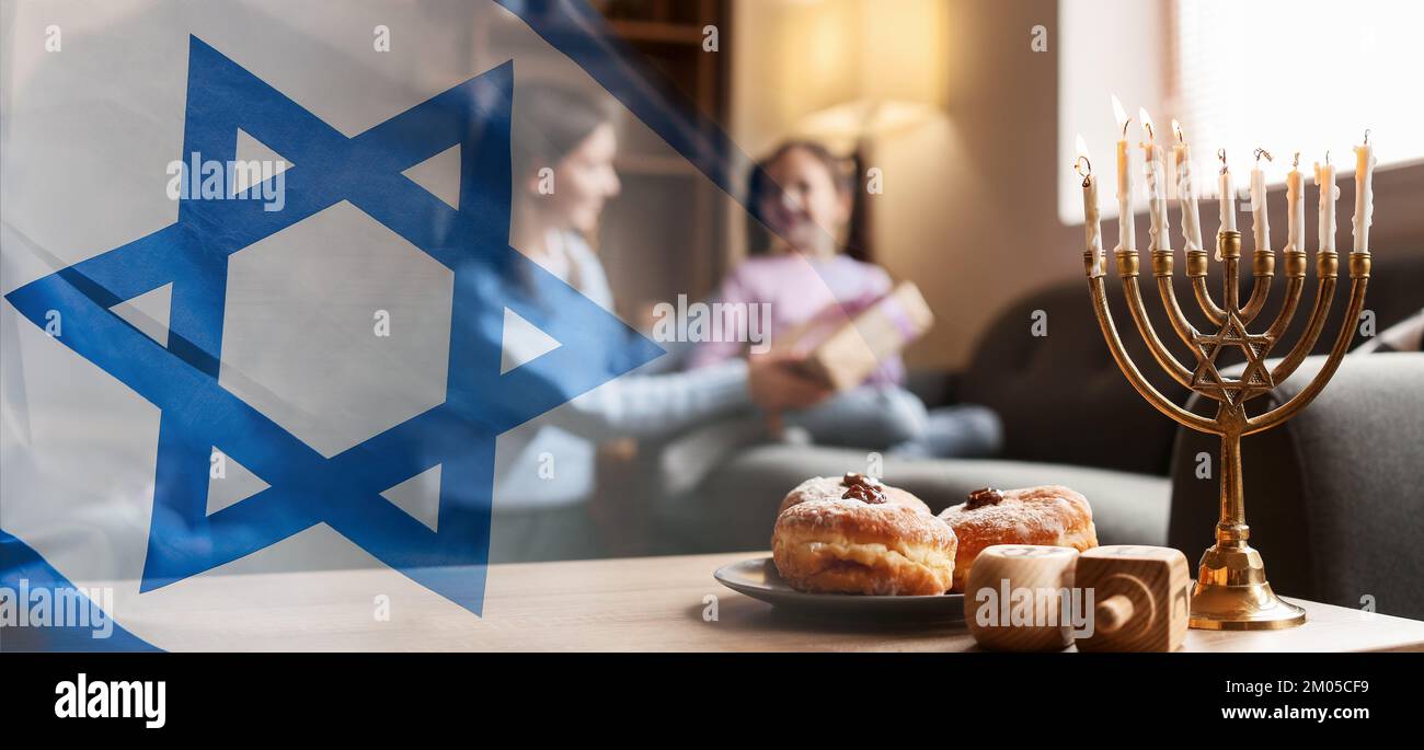 Banner with Israeli national flag and menorah, dreidels and donuts on ...