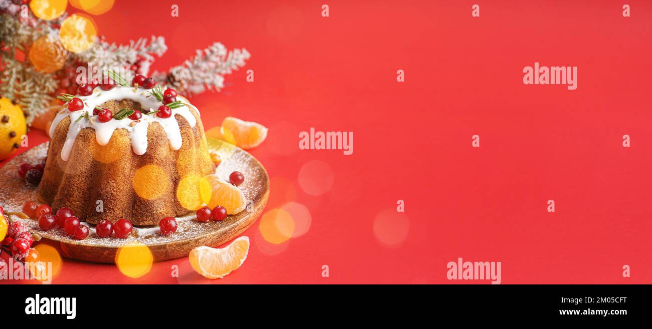Tasty Christmas cake and decor on red background with space for text ...