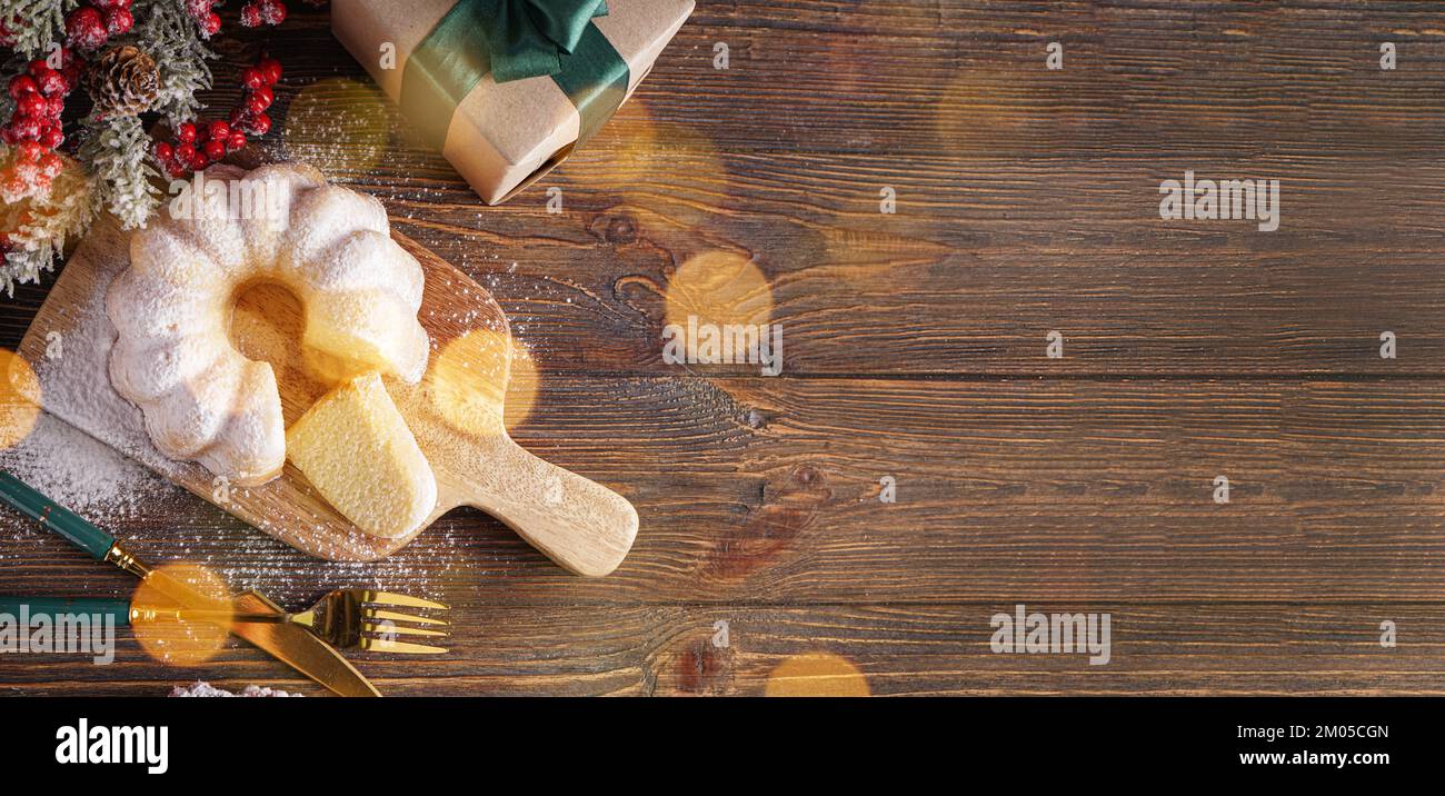 Tasty Christmas cake and decor on wooden background with space for text ...