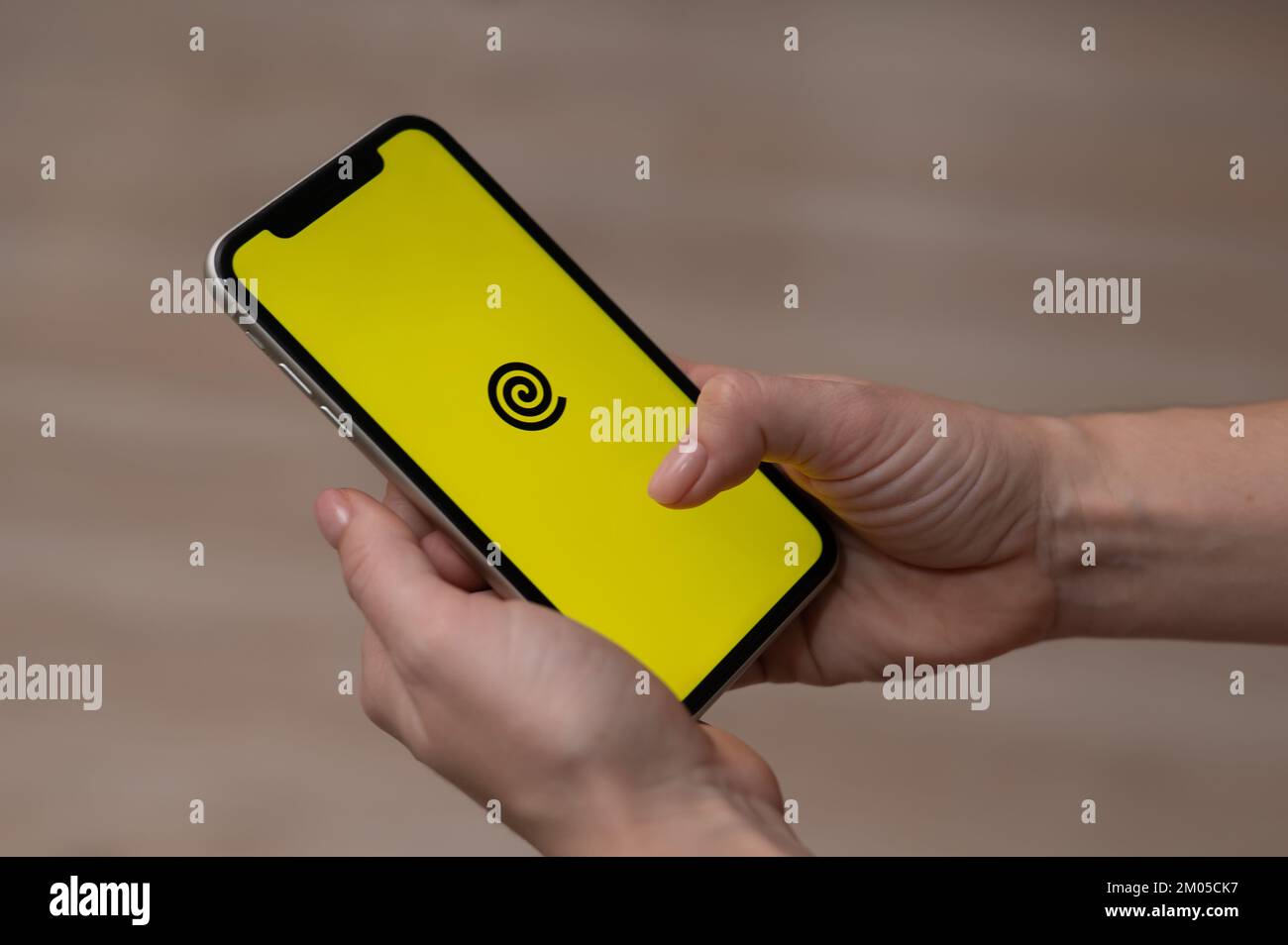 December 3, 2022 Almaty Kazakhstan: Faceless woman holding smartphone ...