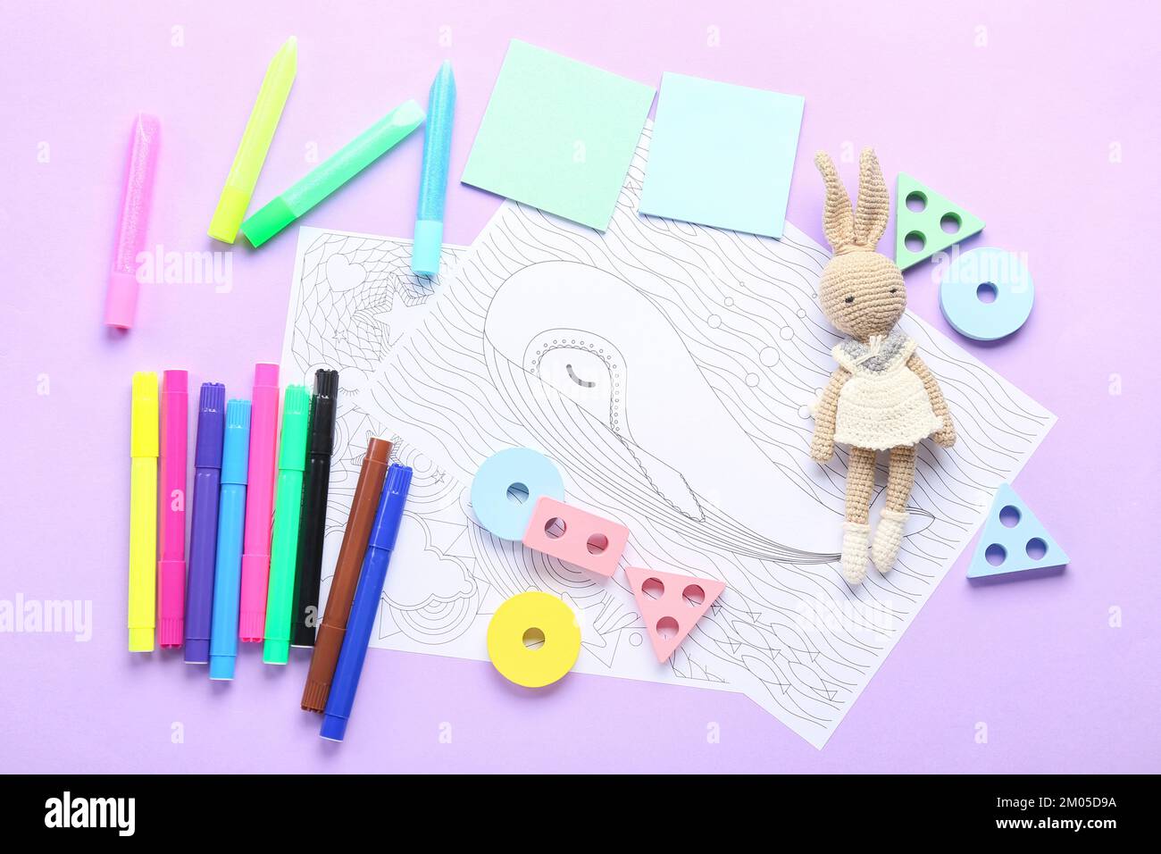 Coloring pages, felt-tip pens and toys on pink background Stock Photo ...