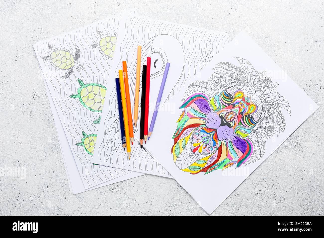 Coloring pages and pencils on grunge background Stock Photo - Alamy
